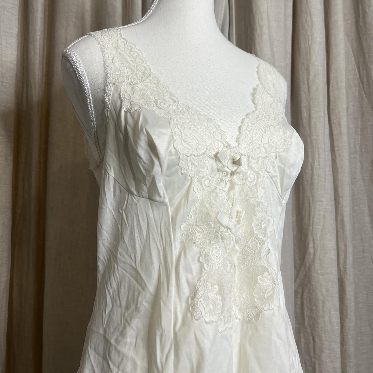 most beautiful laced singlet with bow detail -... - Depop