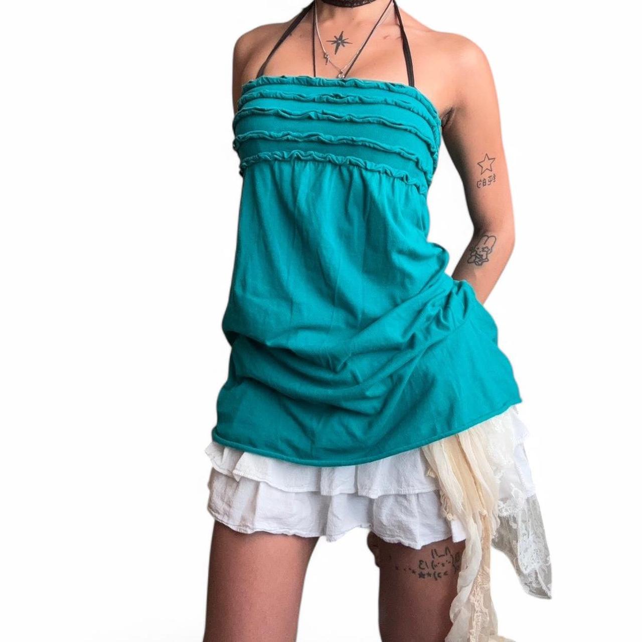 Turquoise ruffle strapless top with a boho vibe... | Depop