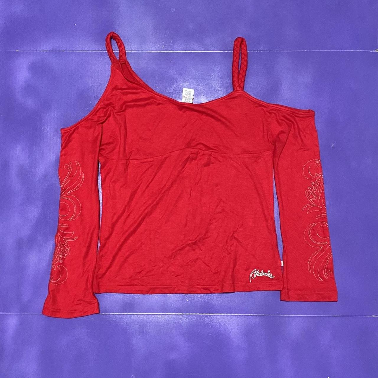 Akdmks red top. Has designs on the sleeves. In great... | Depop