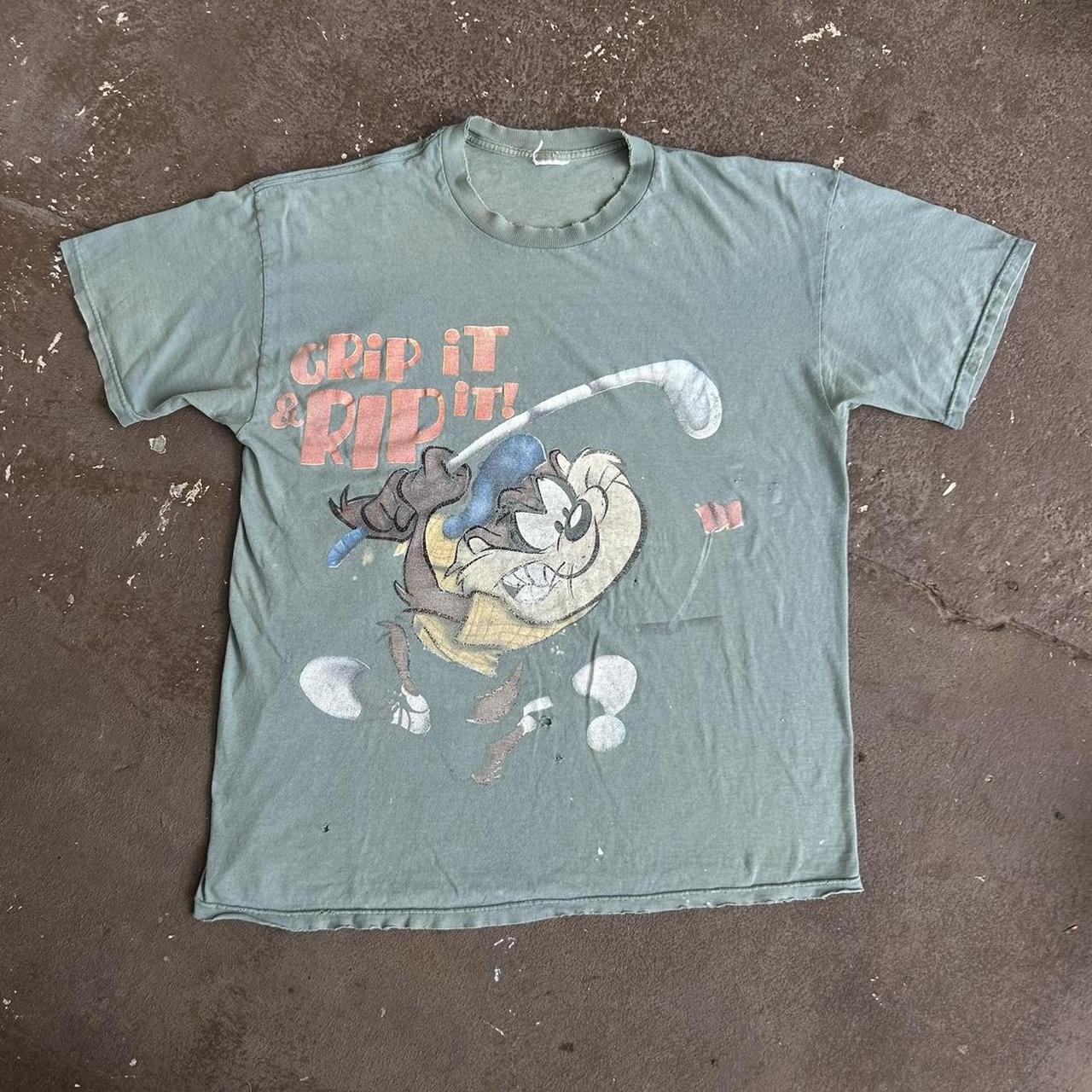 Vintage 1997 Taz Golf Grip it & Rip It Faded... - Depop