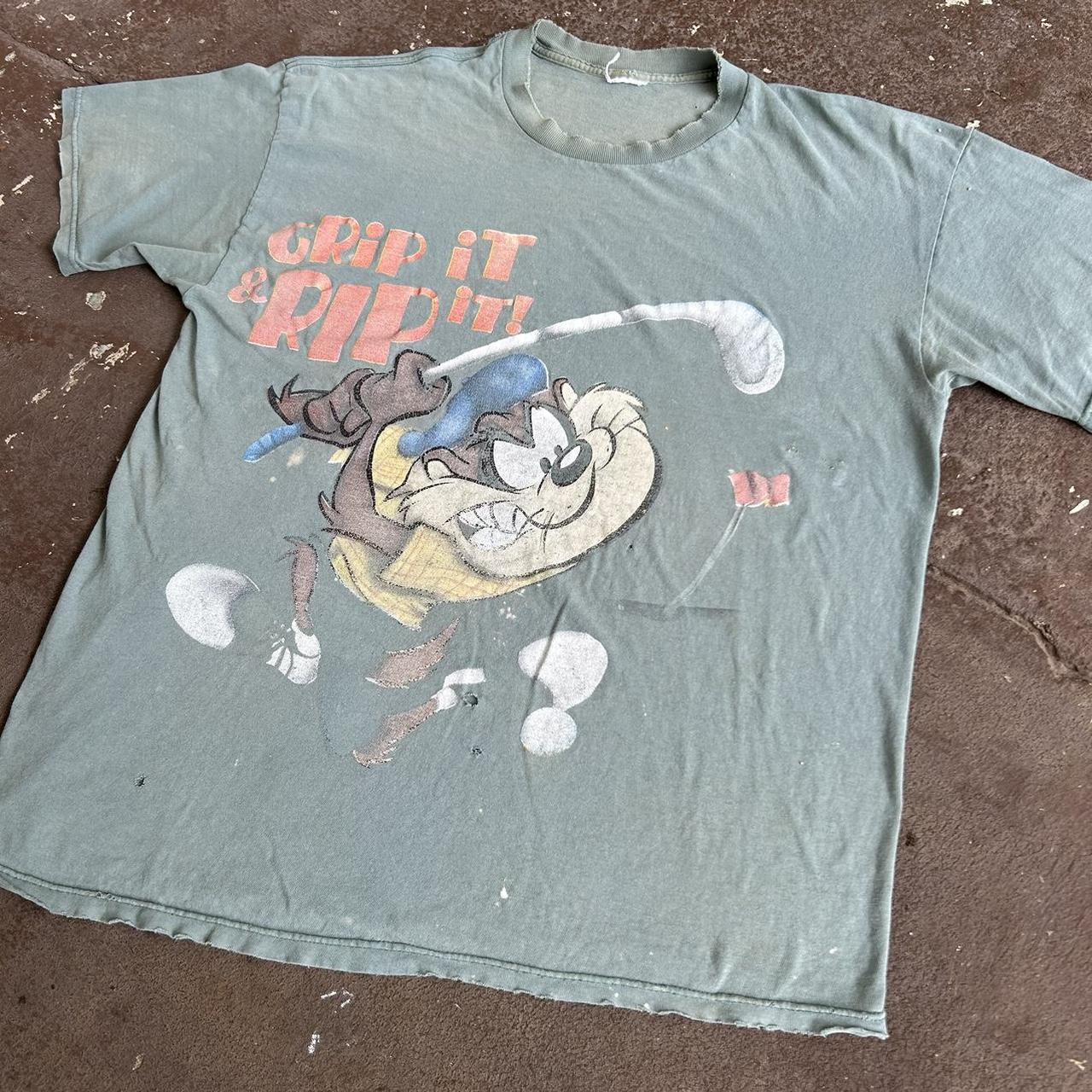 Vintage 1997 Taz Golf Grip it & Rip It Faded... - Depop