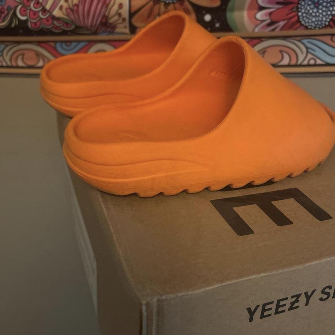 100% authentic orange yeezy slides. bought from... - Depop