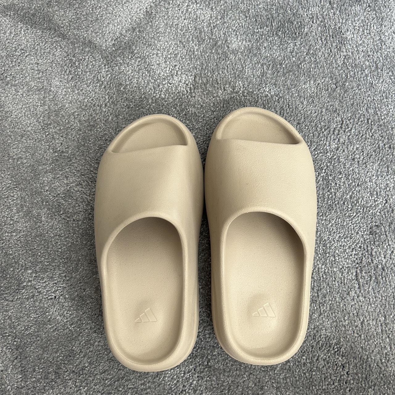 Beige Yeezy sliders only worn a few times Say size... - Depop
