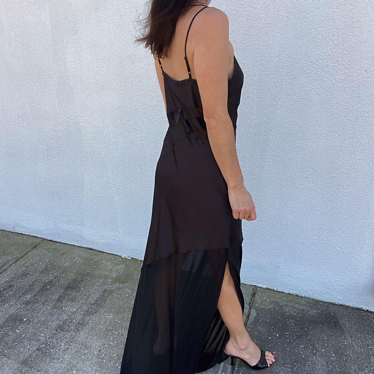 Black Sheer slip dress Sheer panels Bottom hem is... - Depop