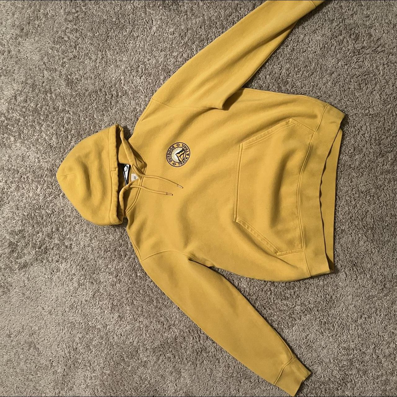 Yellow hoodie w/ graphic - Depop