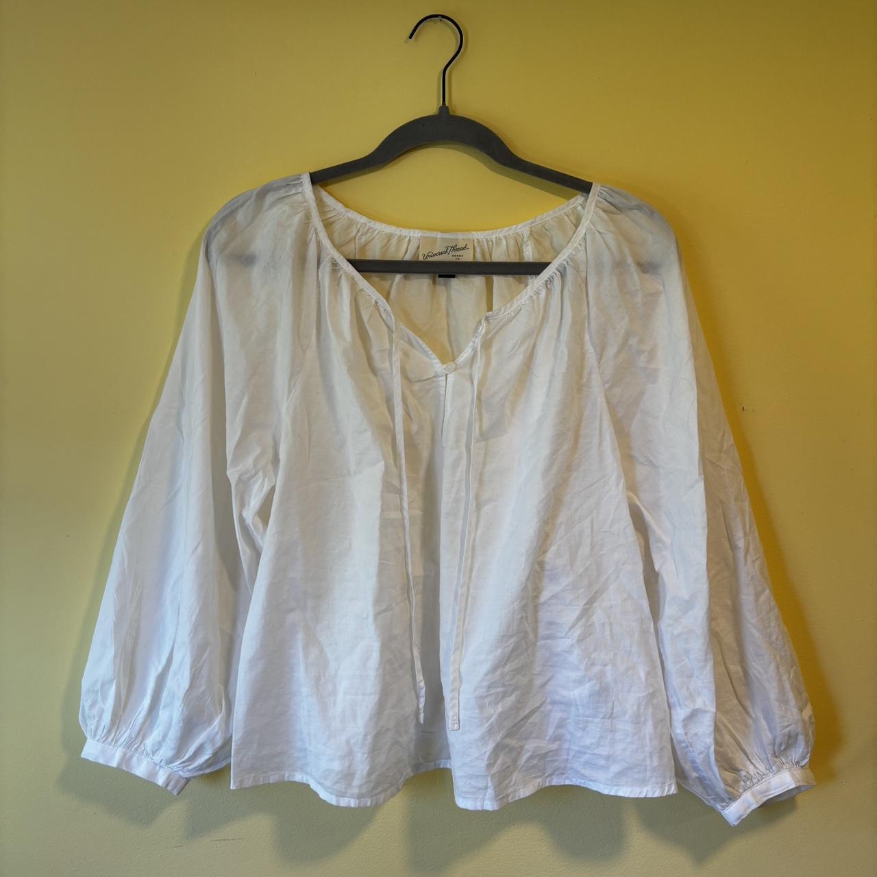 White linen peasant blouse with a V-neckline and... - Depop
