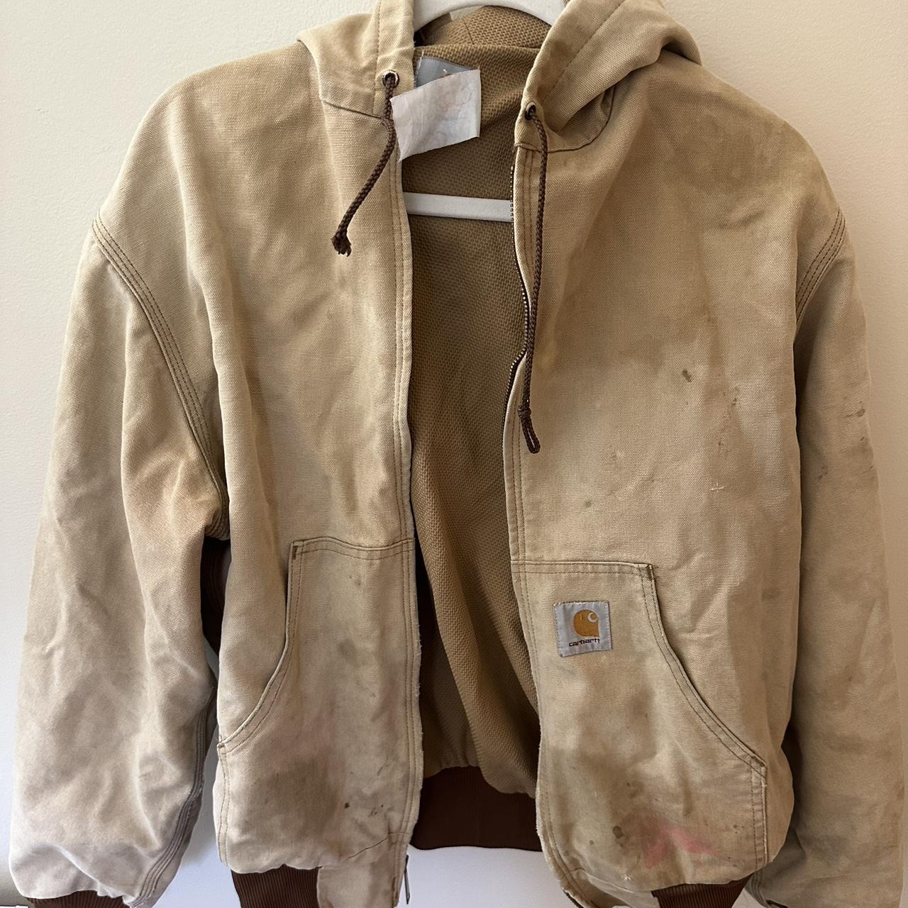 Carhartt beige worker jacket stains shown in... - Depop
