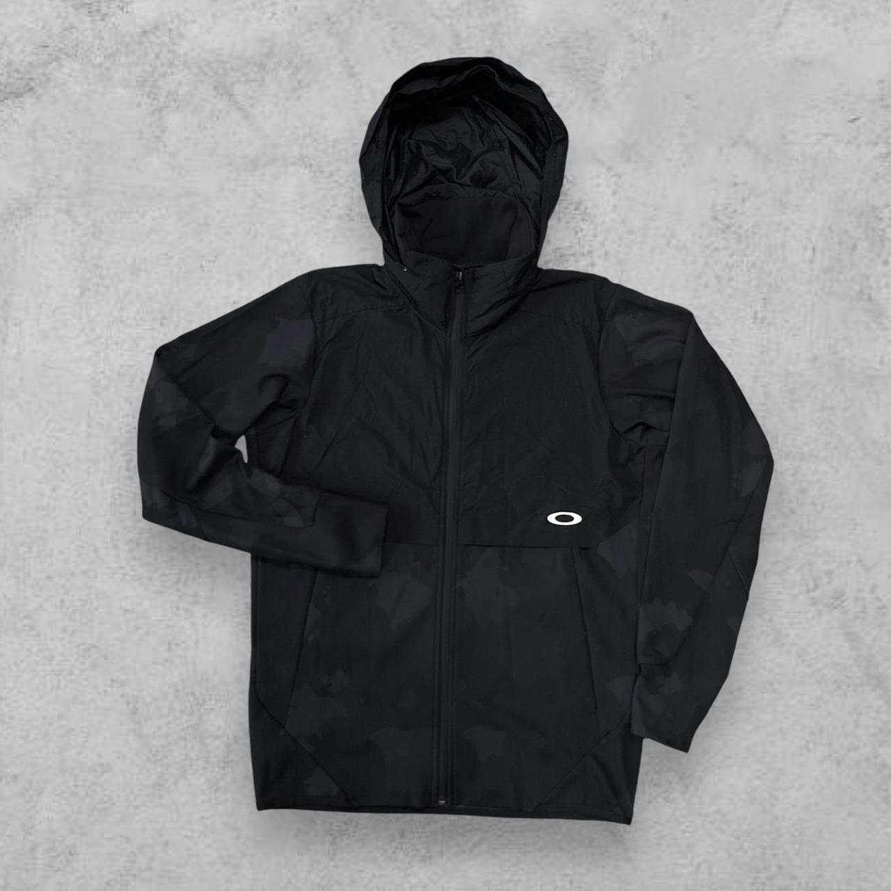 Oakley technical jacket in black and camo. Soft... - Depop
