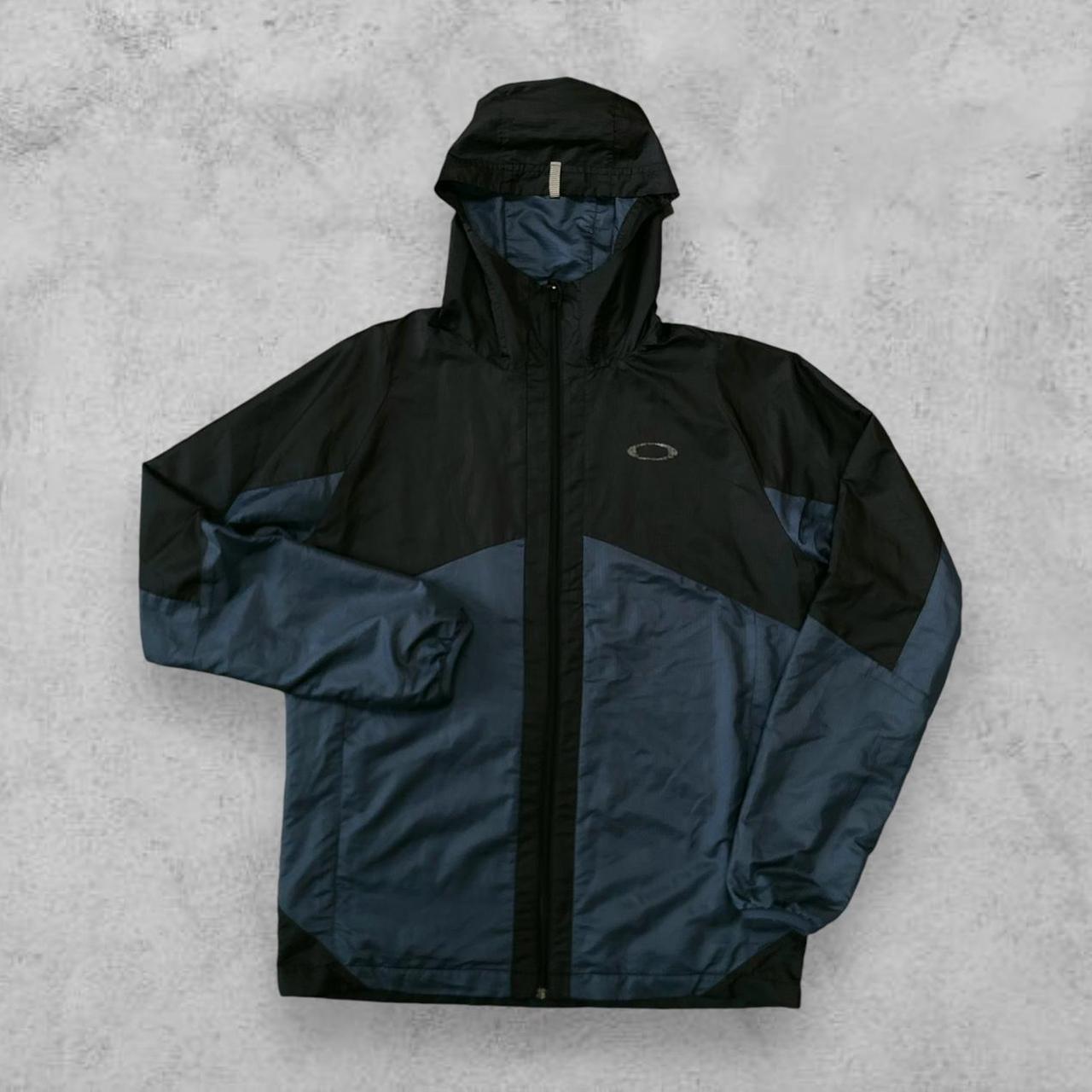 Oakley jacket in teal blue and black. Lightweight... - Depop