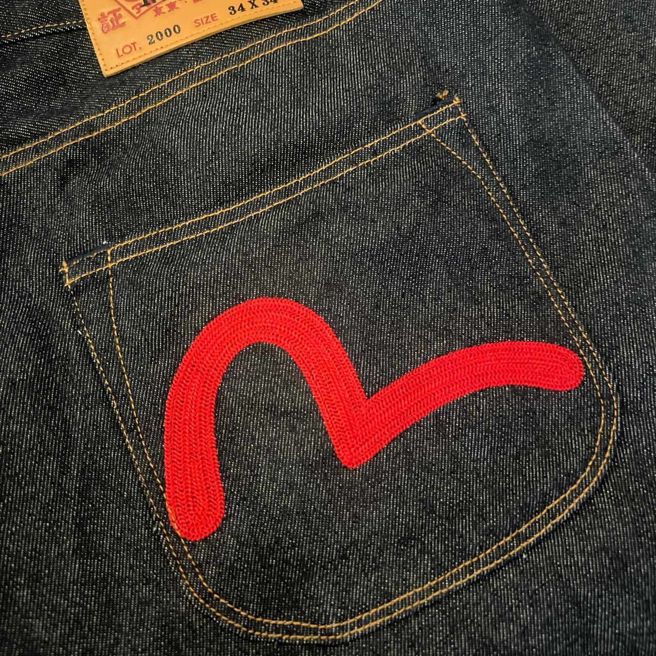 Evisu x hello kitty jeans with embroidered... - Depop