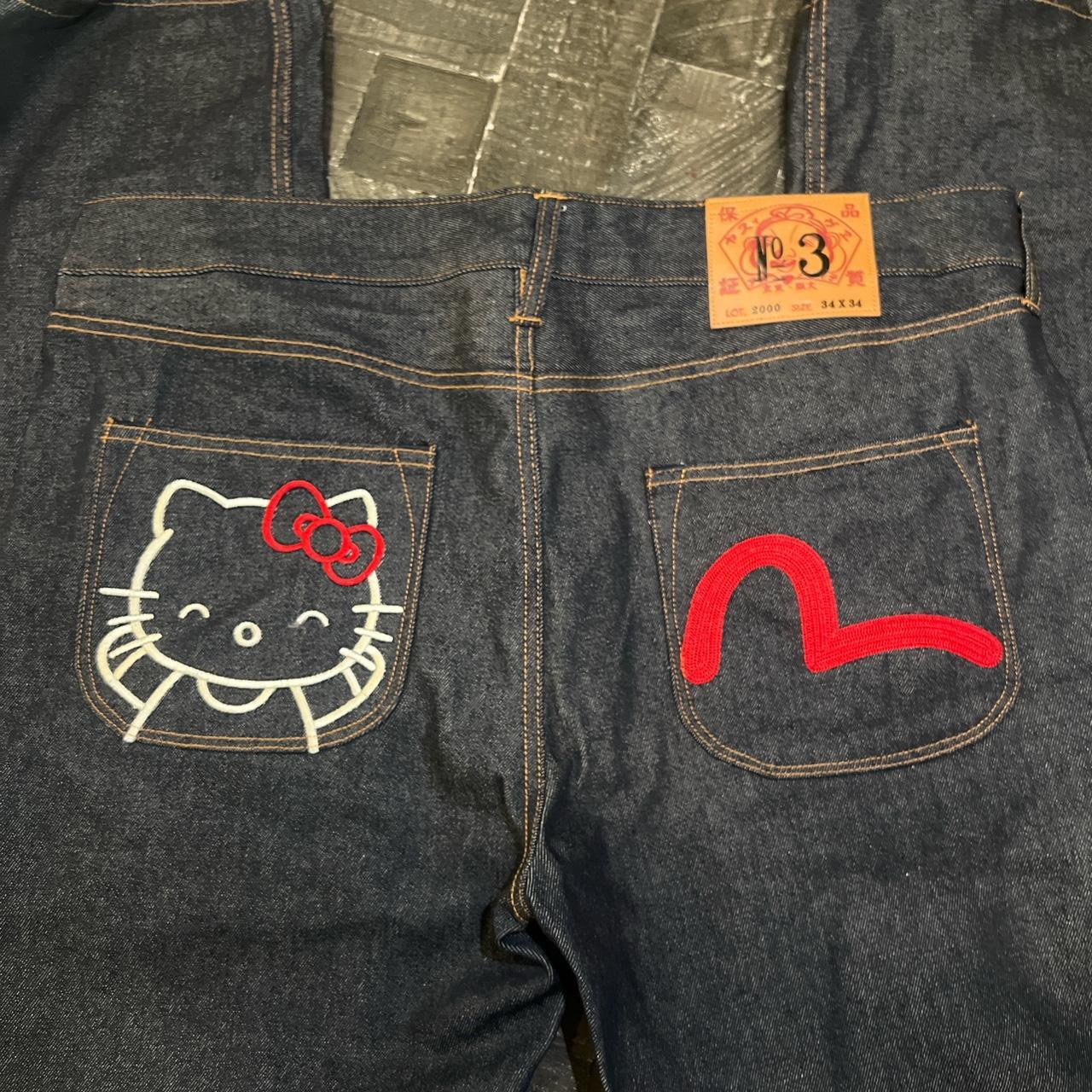 Evisu x hello kitty jeans with embroidered... - Depop