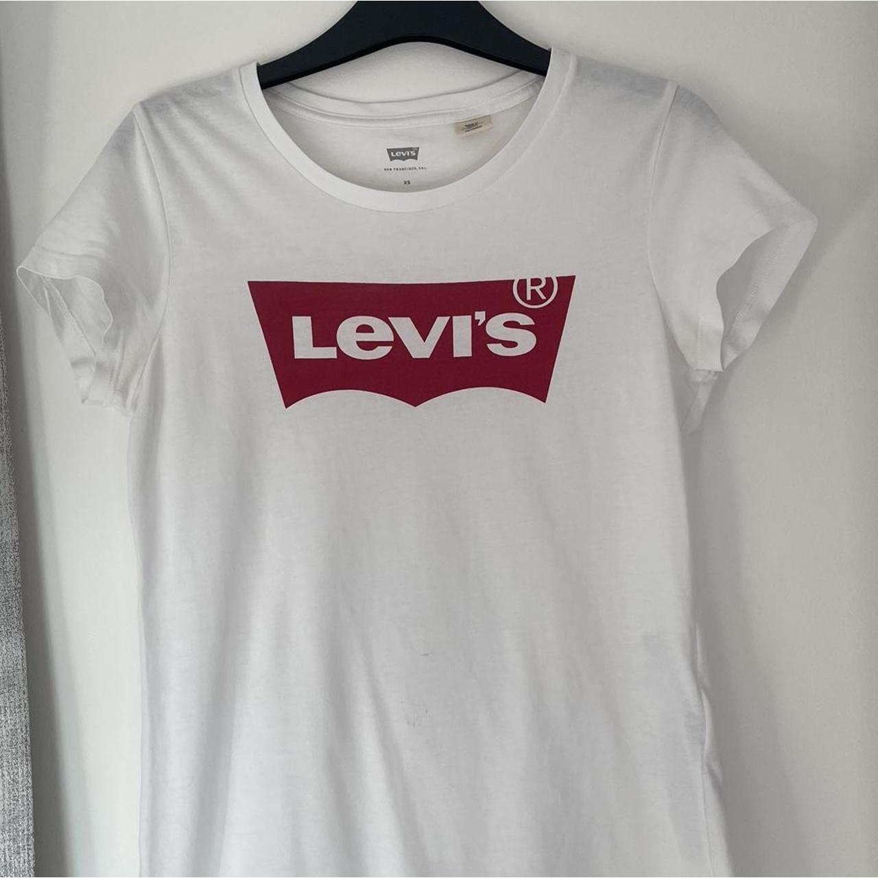 White Levi top with bold logo in middle - Depop