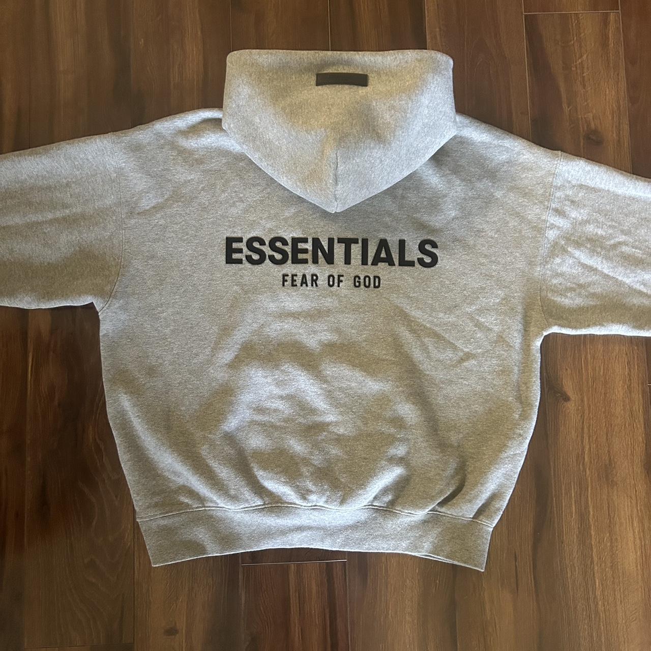 grey essentials hoodie - Depop