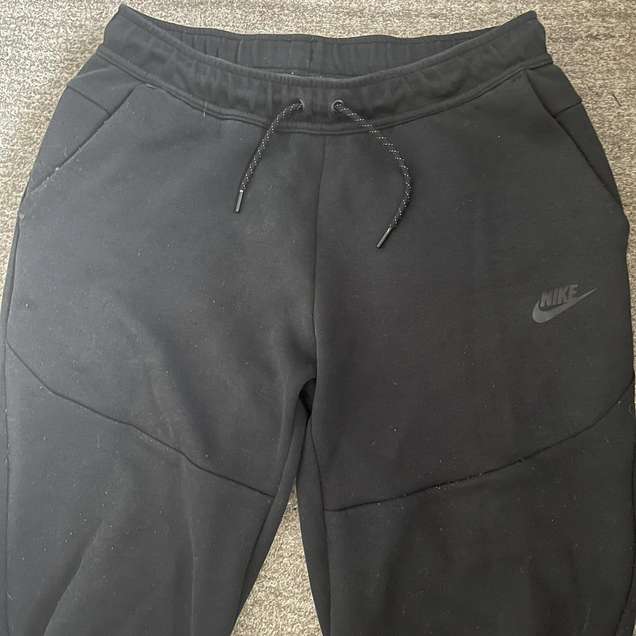 Black Nike tech fleece trackies size m - Depop