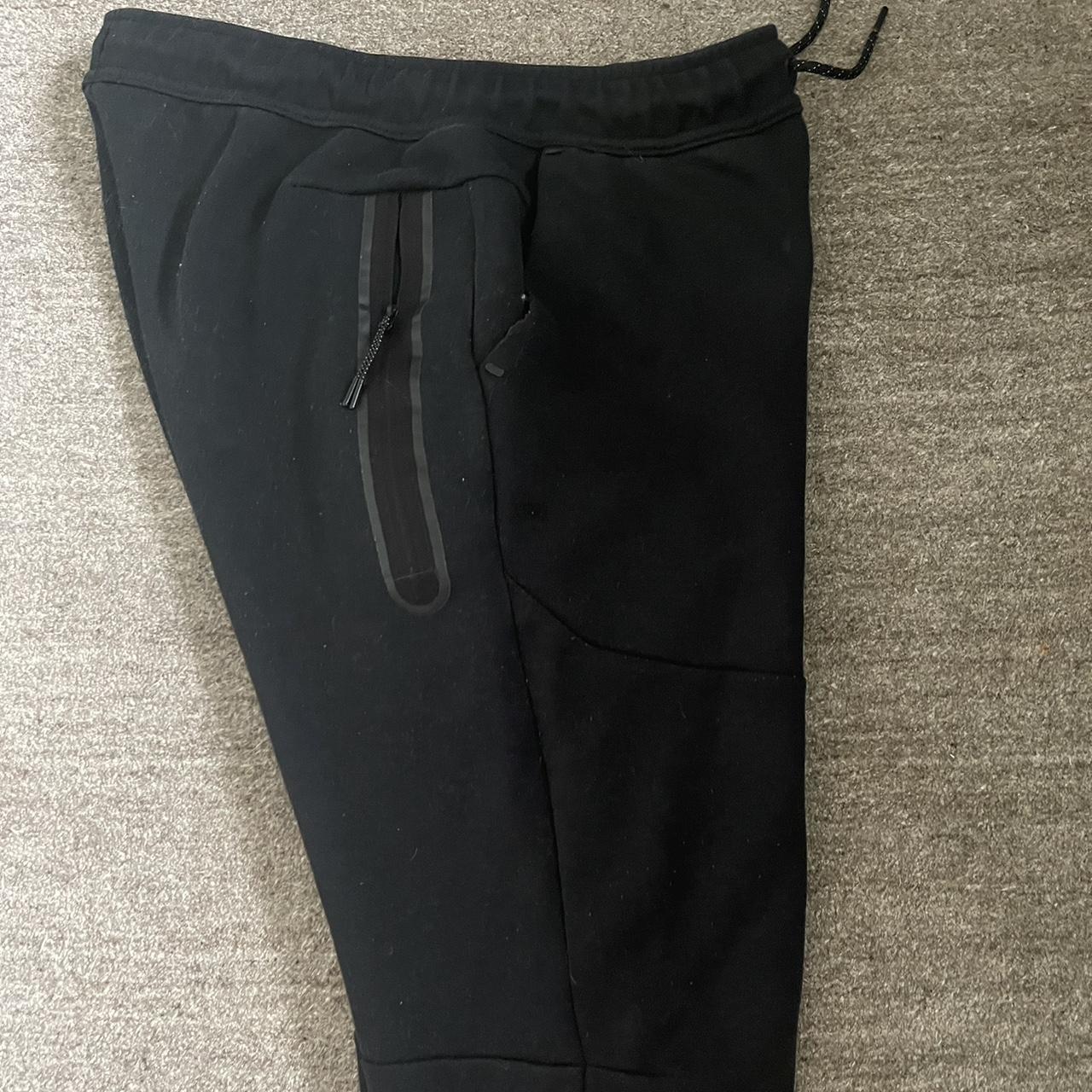 Black Nike tech fleece trackies size m - Depop