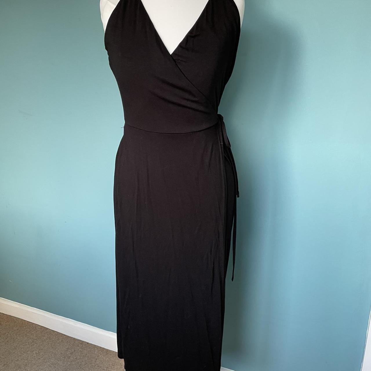 Black, wrap around dress with racer back. Warehouse... - Depop