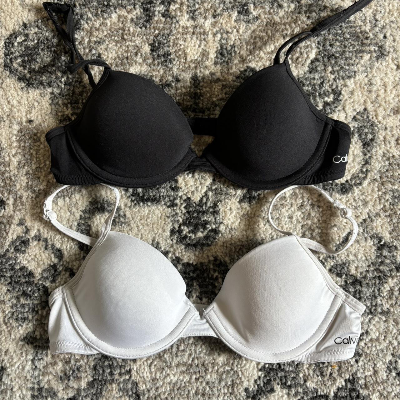 2 Calvin Klein bras size 32A. Worn maybe a couple... - Depop