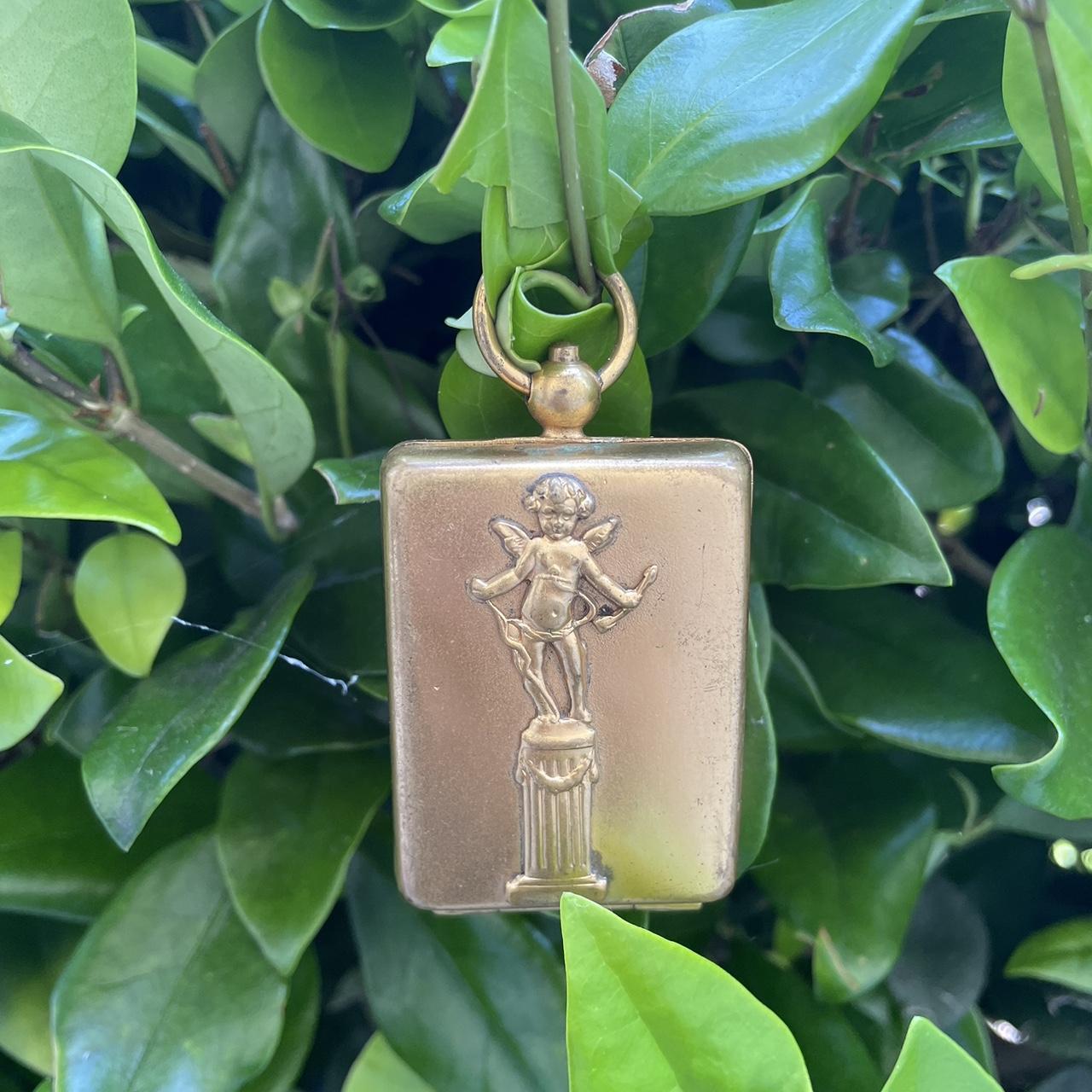 Gold tone vintage cherub trinket box/compact with... - Depop