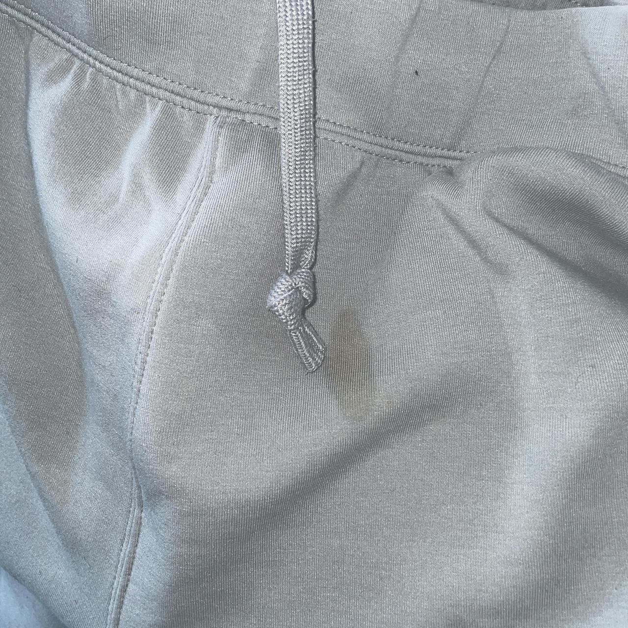 Uniqlo tracksuit grey and black Minor stain which... - Depop