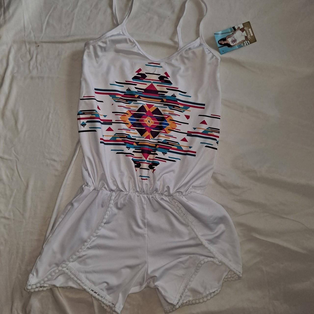 white romper with tribal pattern on front. brand... - Depop