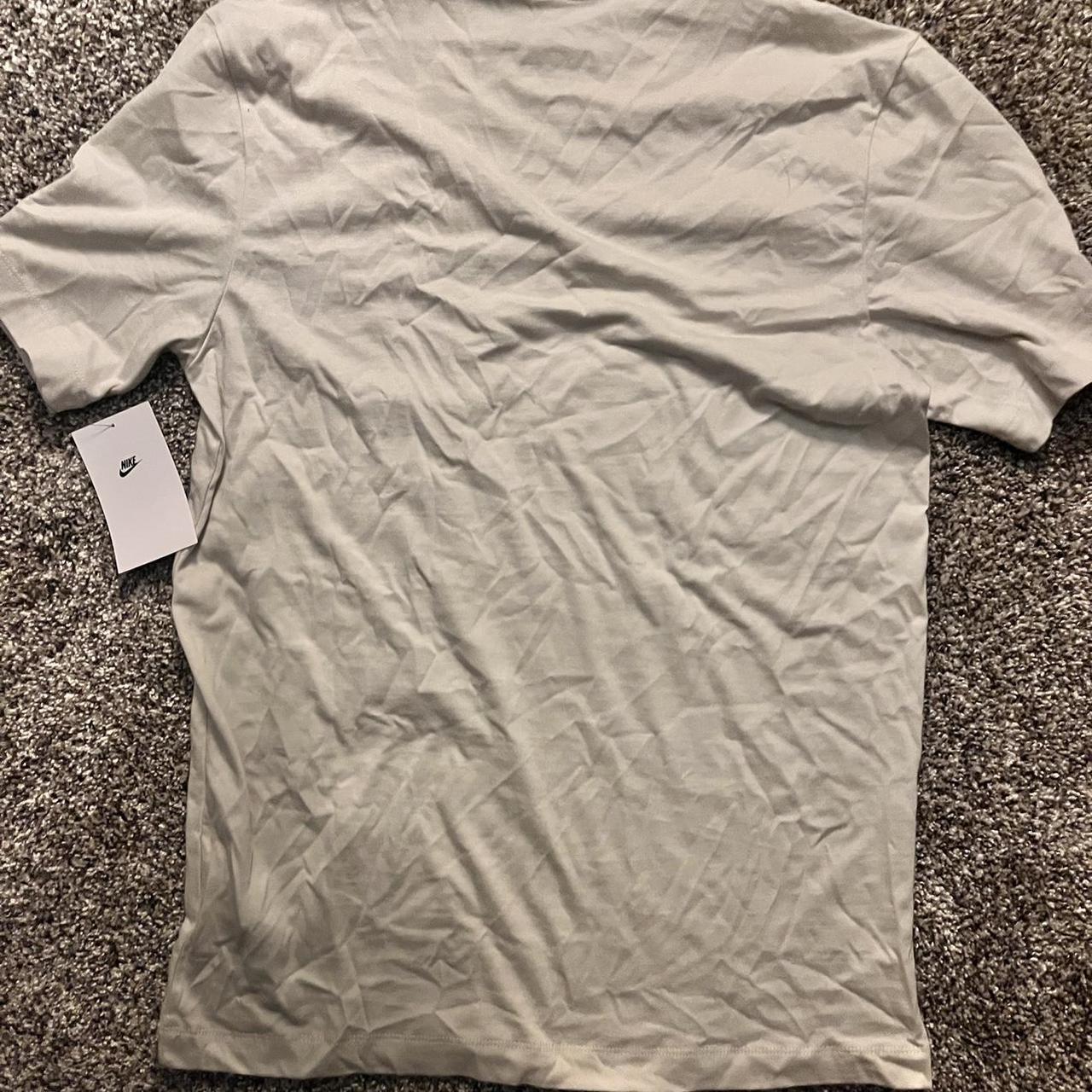 small tan nike cotten shirt never worn tag still on... - Depop