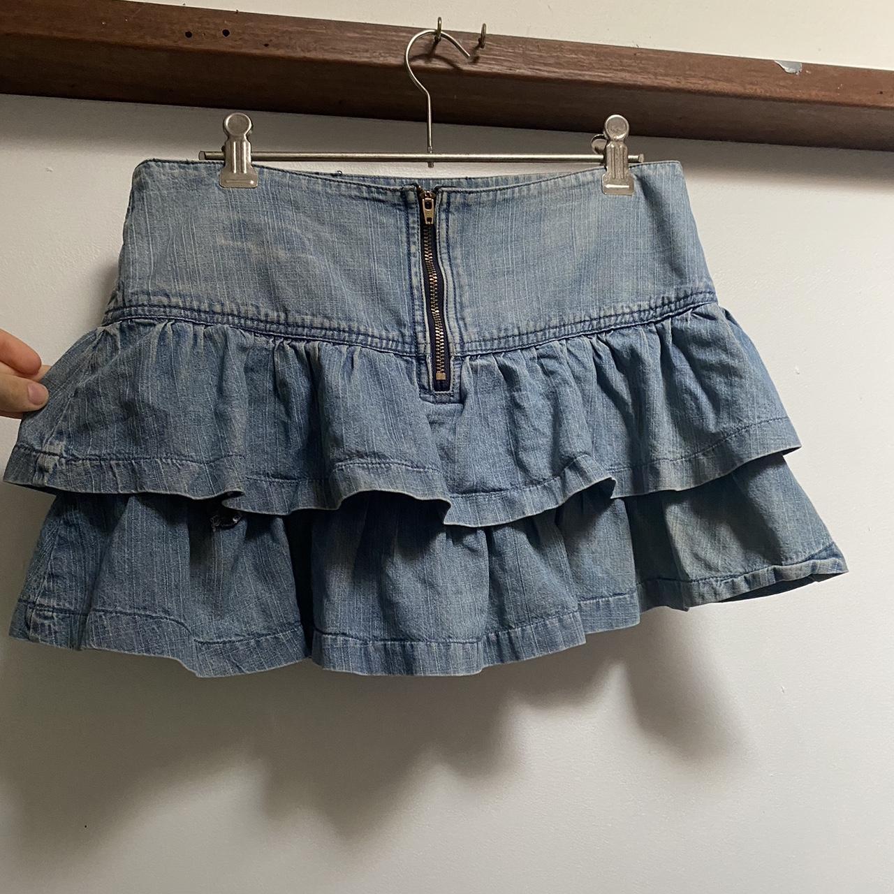Denim ruffle mini skirt! Been worn but in good... - Depop