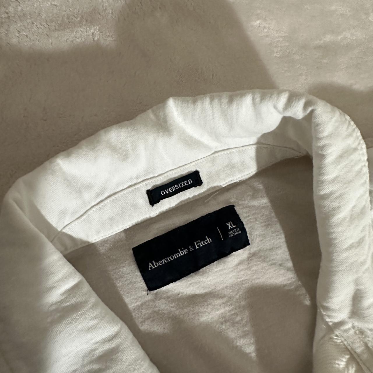 Abercrombie & Fitch Men's Tan and Blue T-shirt | Depop