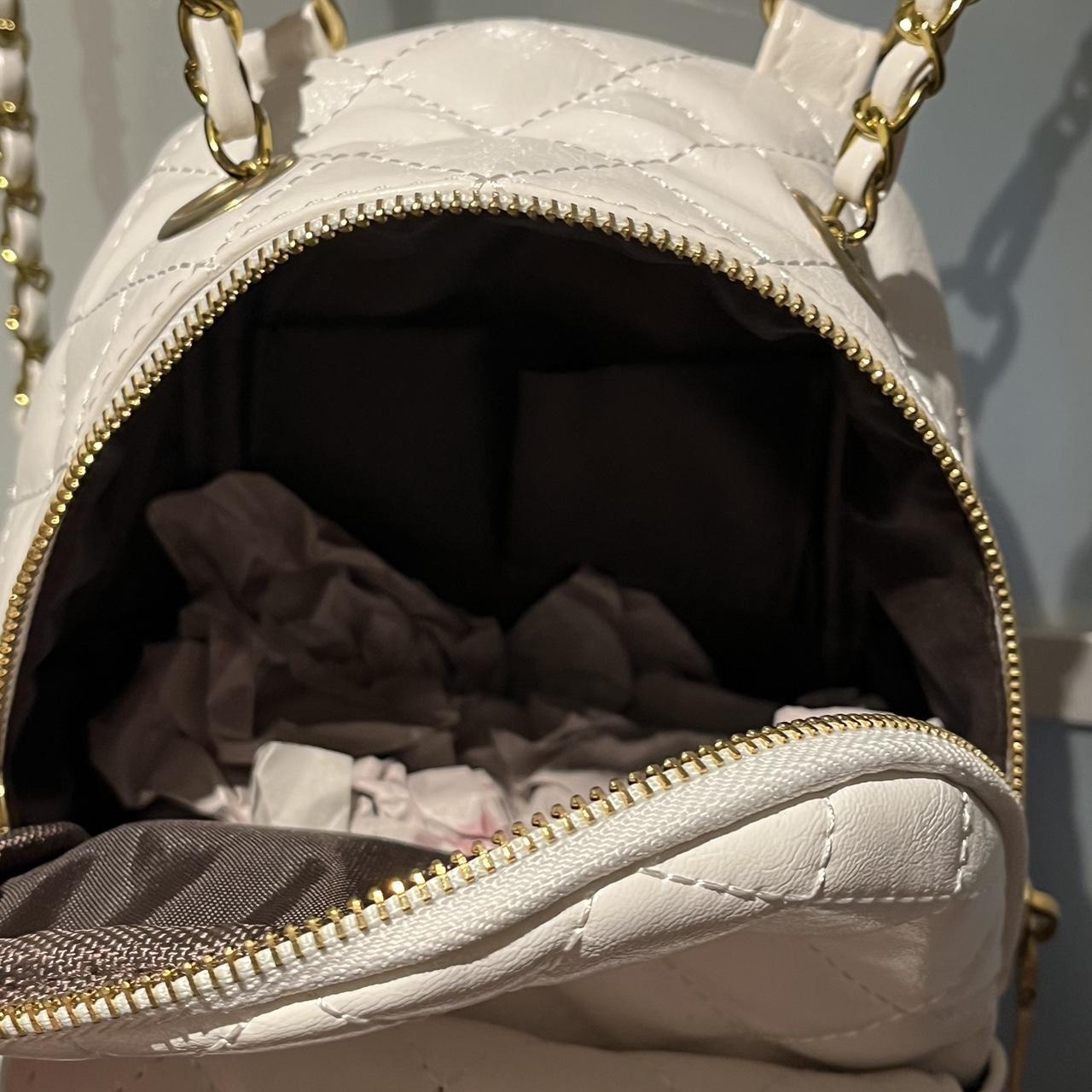White mini backpack with gold chain strap Can... | Depop
