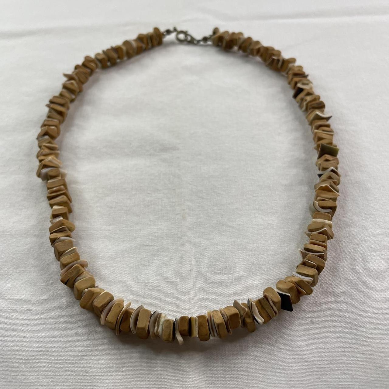 Brown shell necklace. Boho hippie vibes, great piece... - Depop