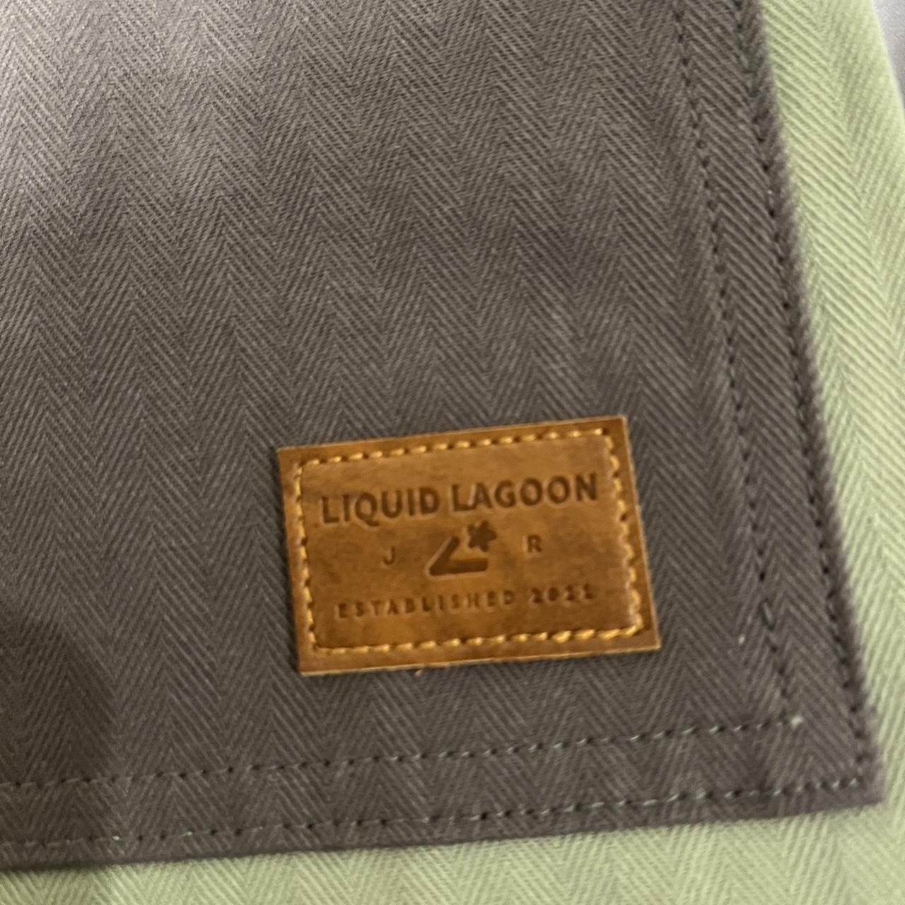 Green and grey liquid lagoon pants, size 30/32,... - Depop