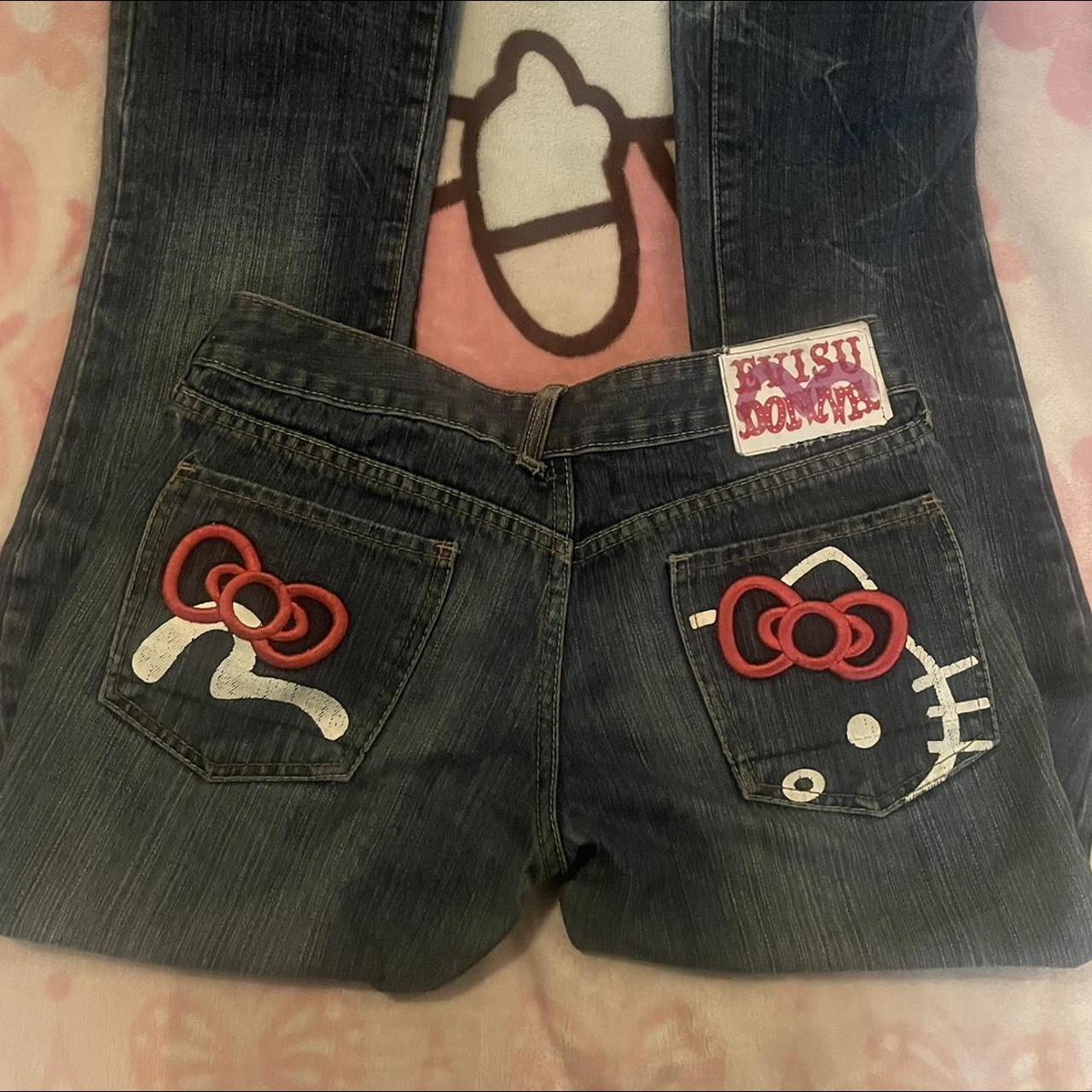 Hello kitty jeans and low rise and a little flare... - Depop