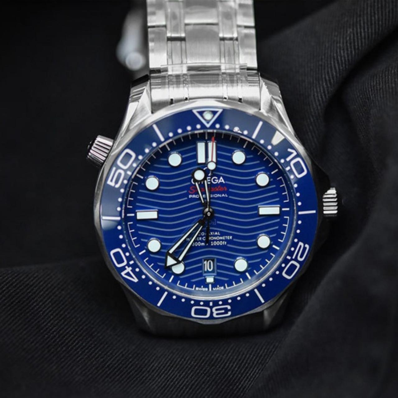 Omega Men's Blue and Silver Watch | Depop