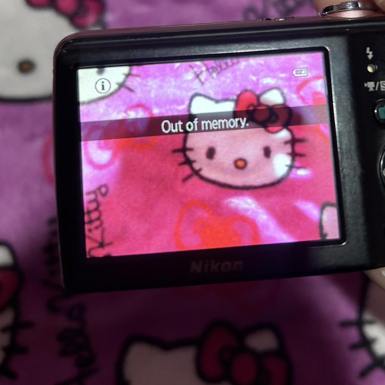 Pink Nikon Coolpix digital camera that has the... | Depop