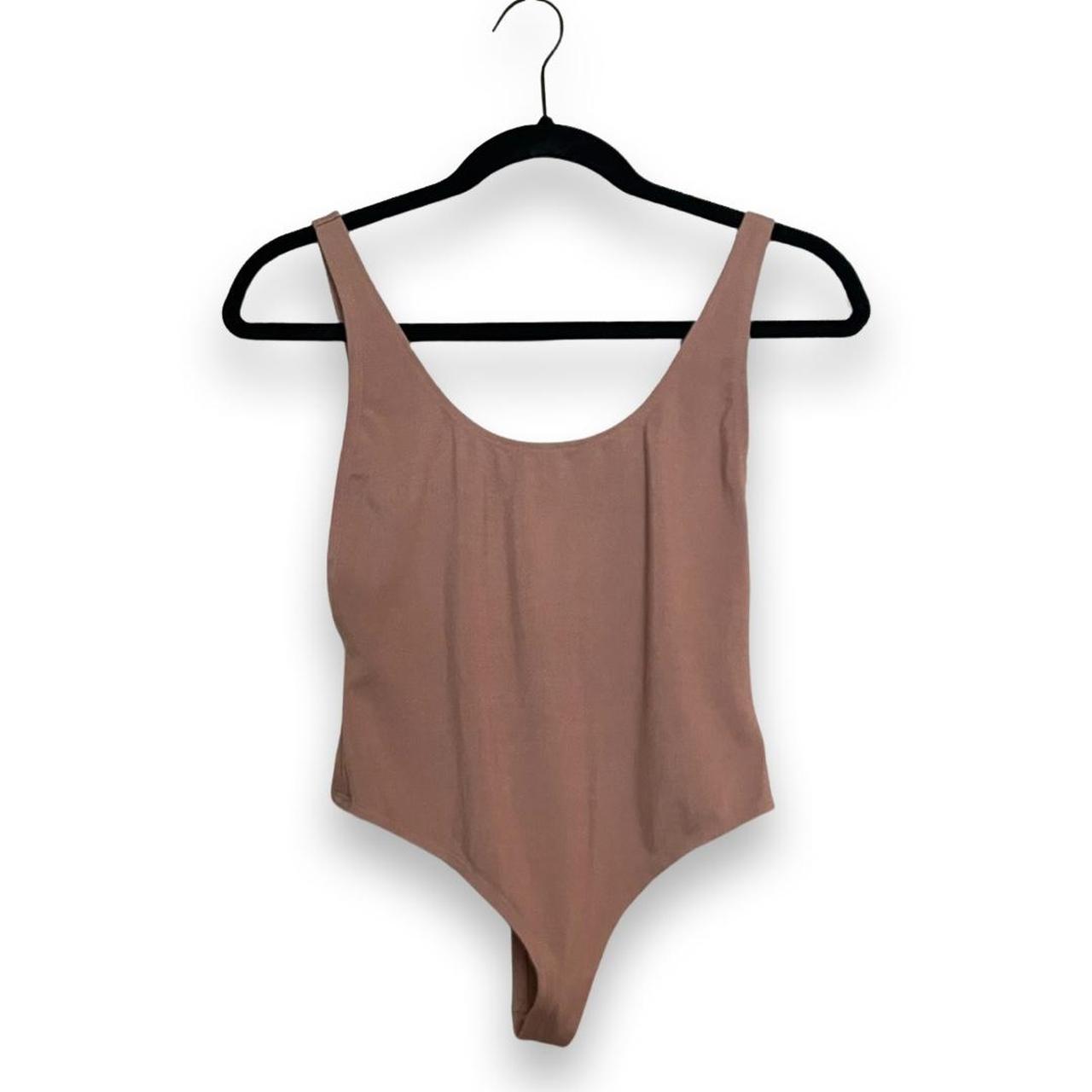 High-hip low cut sleeveless thong tan bodysuit... - Depop