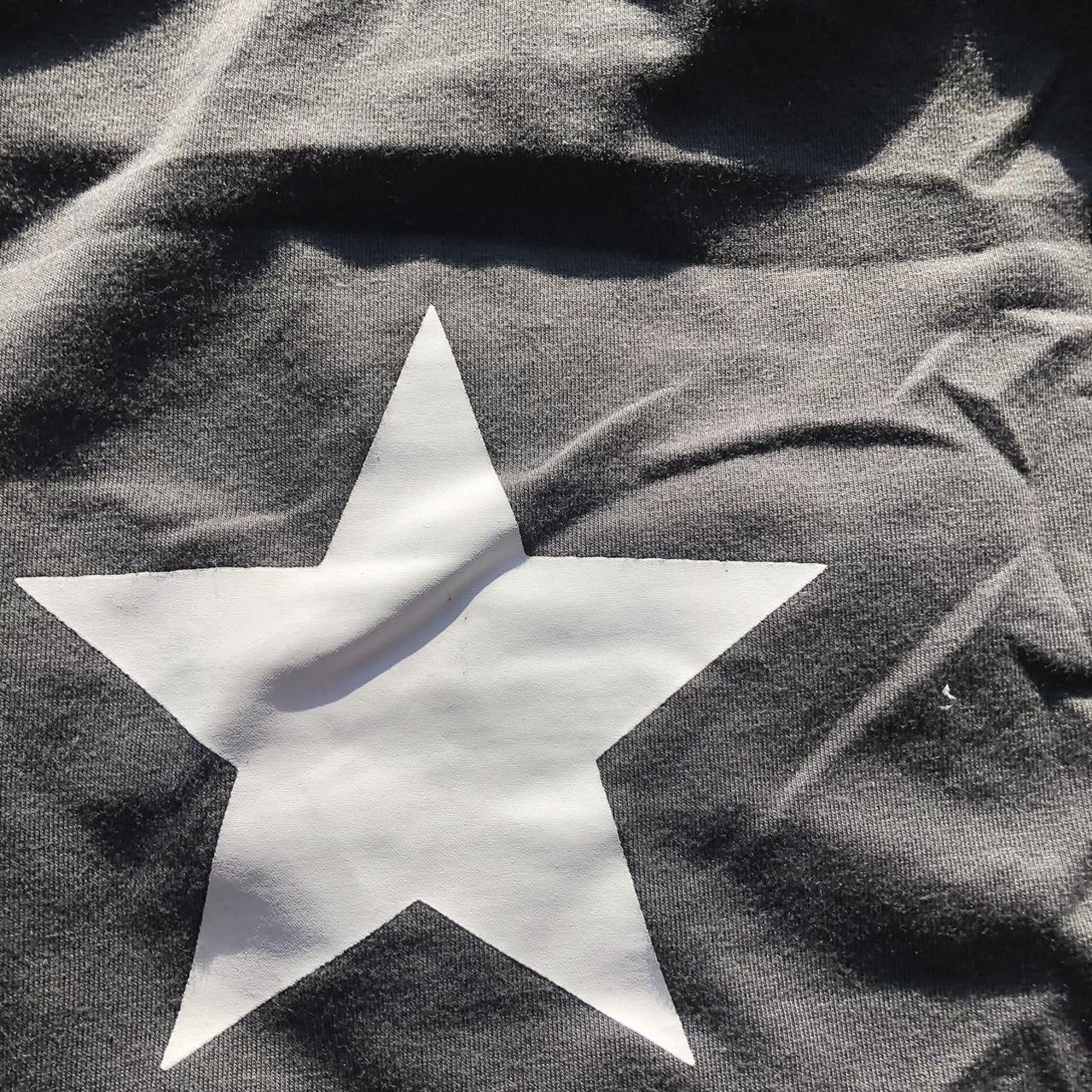 Grey long sleeve shirt with white star. Slightly... - Depop