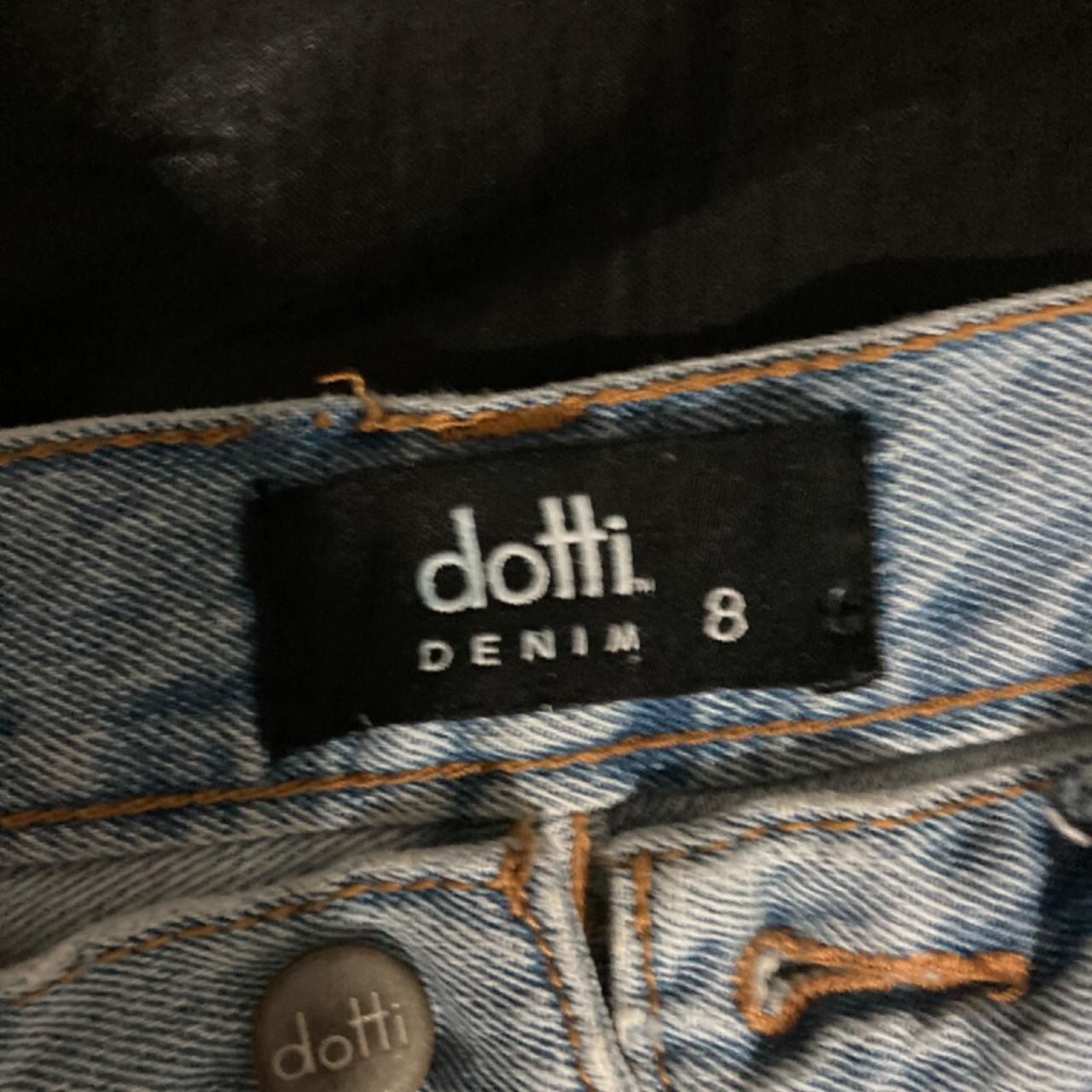 dotti ripped mum jeans in a light washed blue, au... - Depop