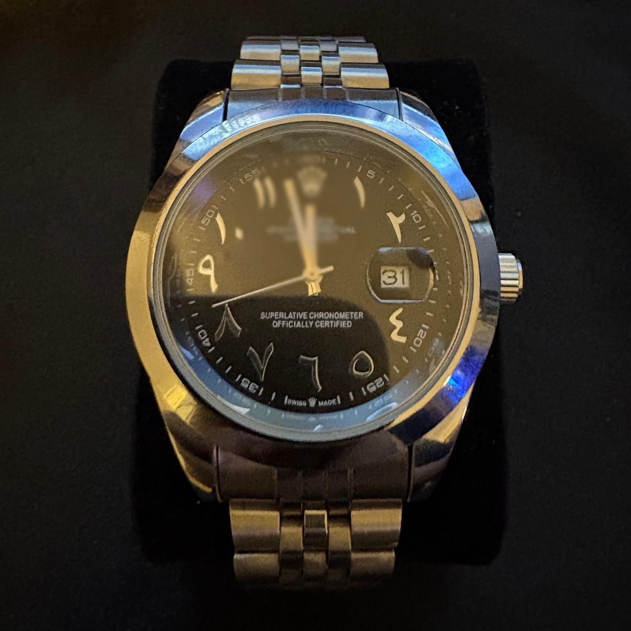 Silver analogue Rollie watch with black face... | Depop