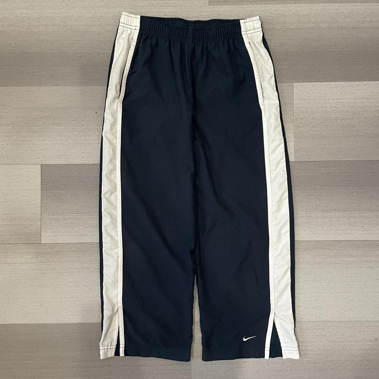 vintage navy blue nike track pants white stripes,... - Depop