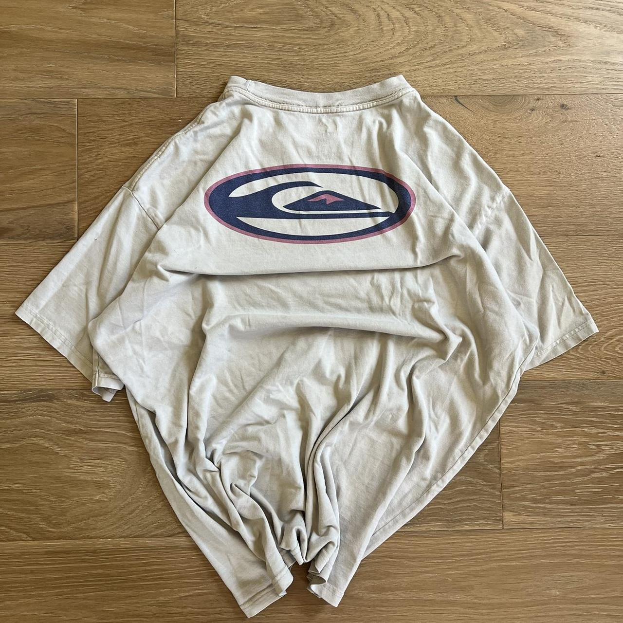Quicksilver white and blue tee #surfwear Some wear... - Depop