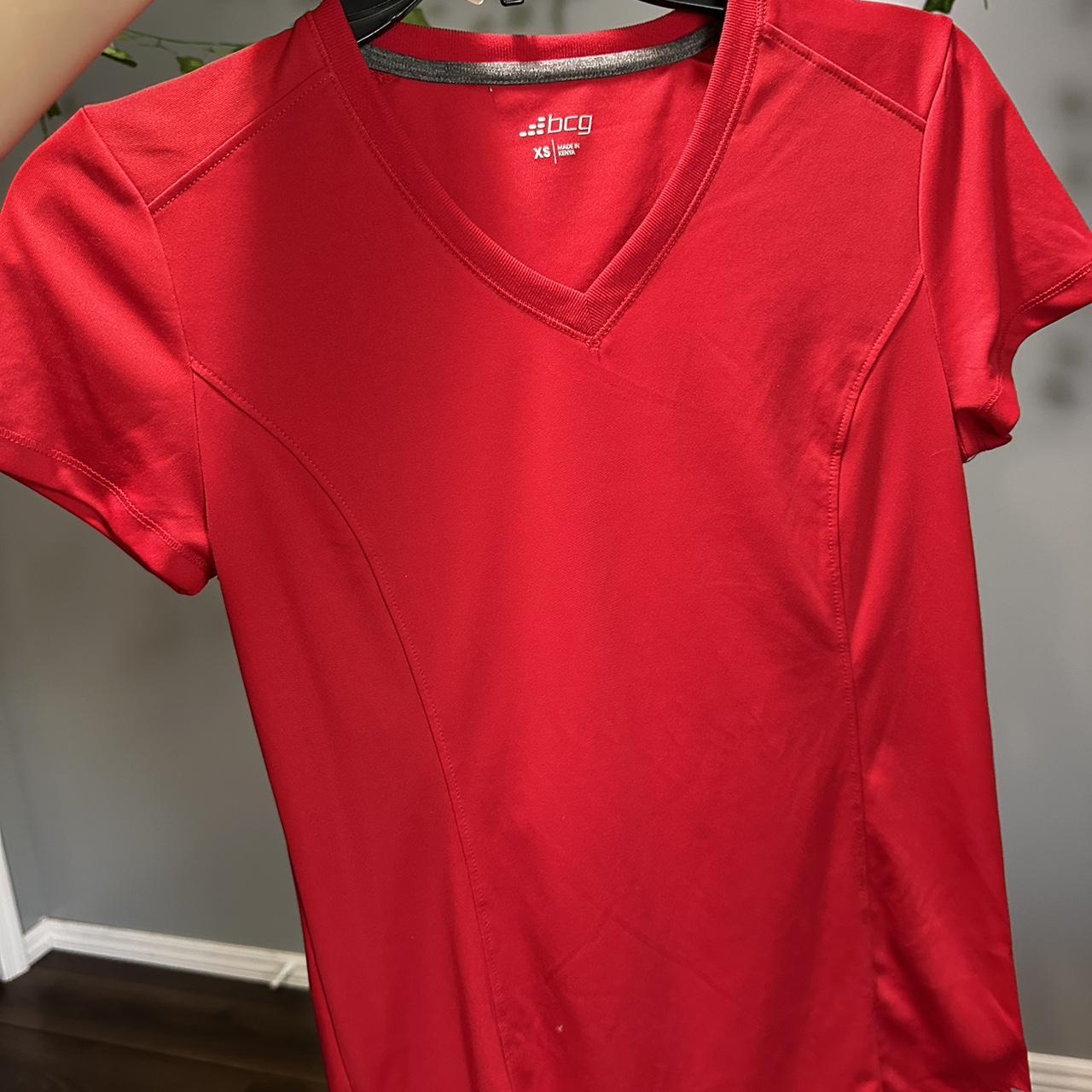 bright red athletic shirt - vcut neck - size xs but... - Depop