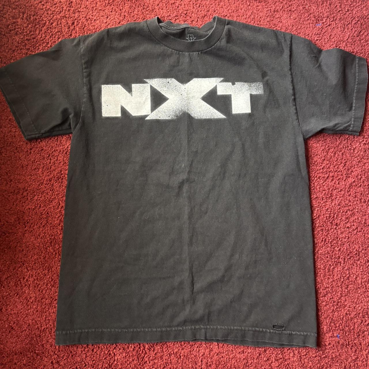 Black and white NXT wrestling t-shirt... | Depop