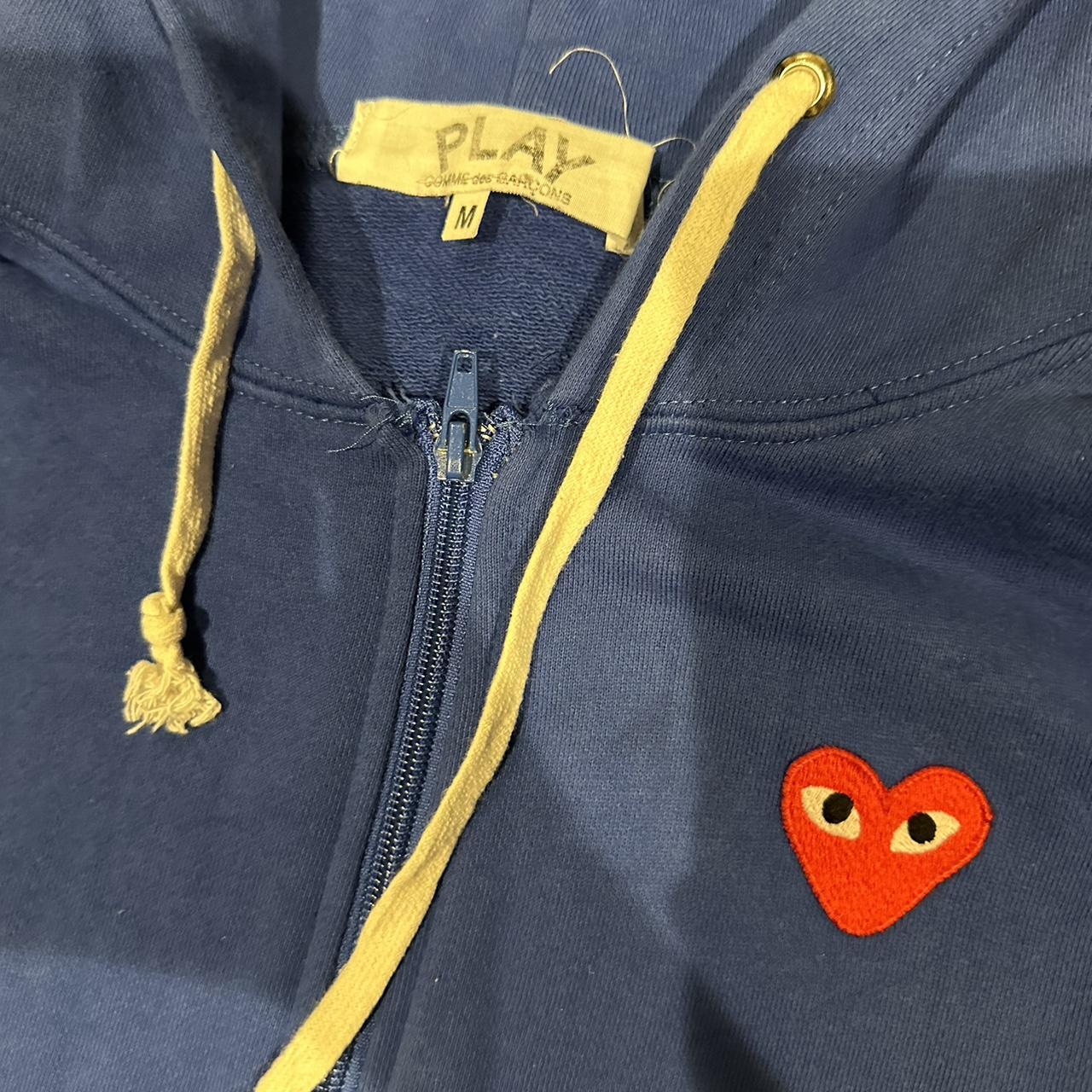 CDG PLAY blue with red heart zip up size medium fits... - Depop