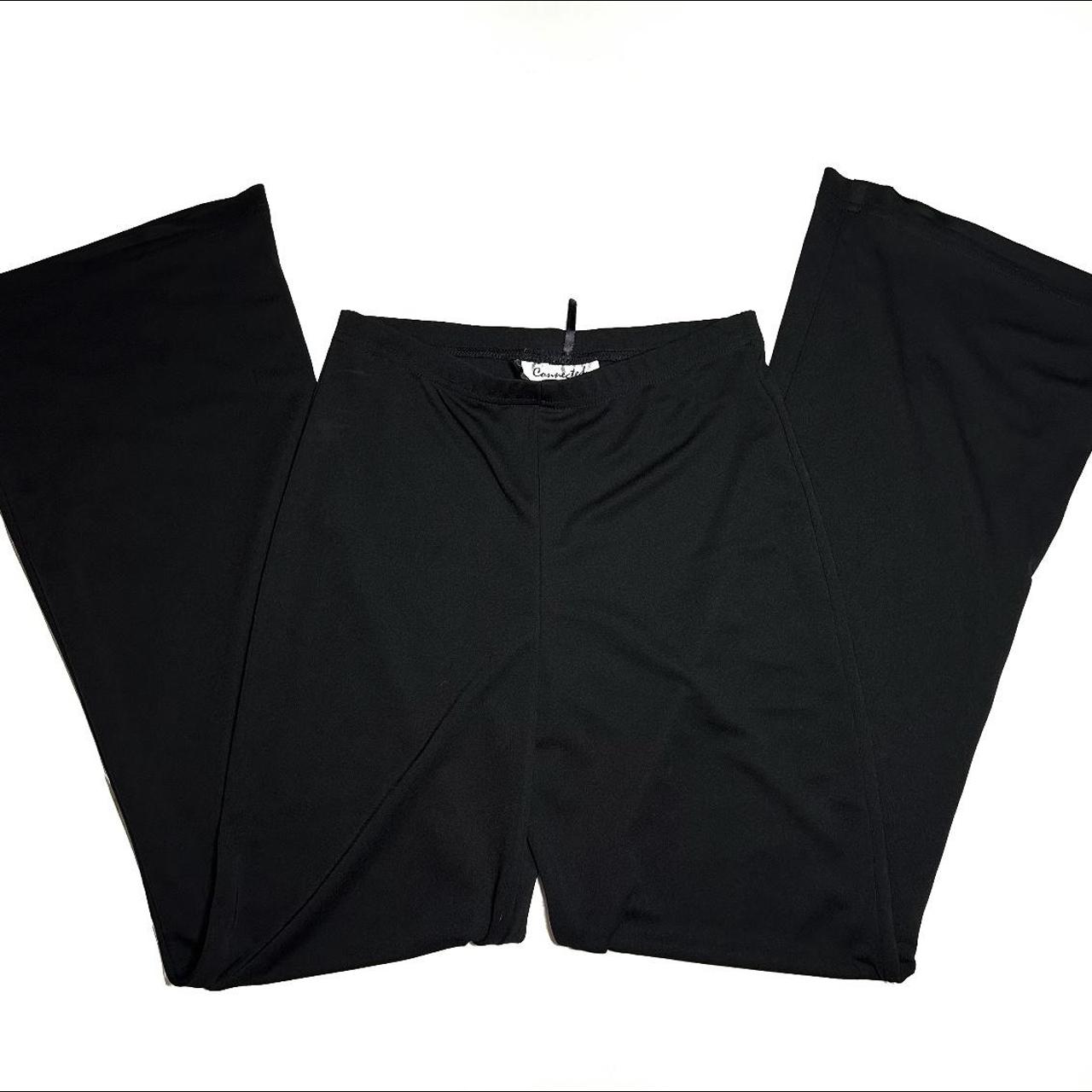 Connected black flare pants size small They’re... - Depop
