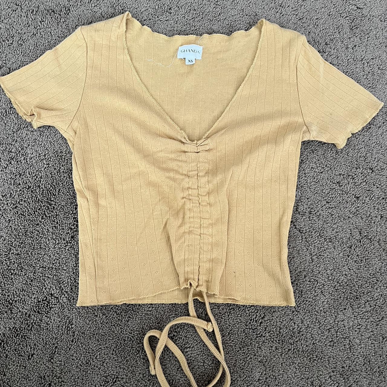ghanda tan crop top with a tie in the front. super... - Depop