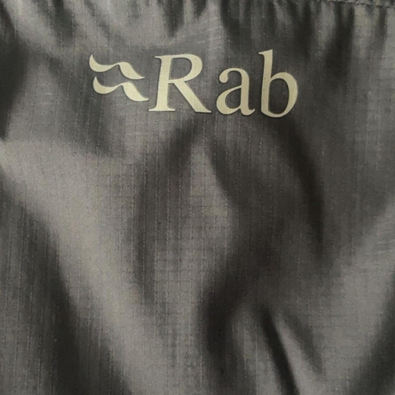 Large grey and orange RAB jacket lightly worn with... - Depop