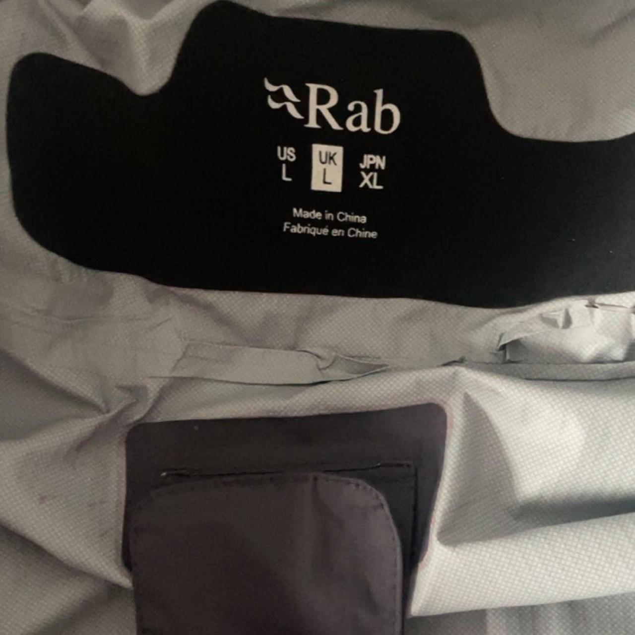 Large grey and orange RAB jacket lightly worn with... - Depop