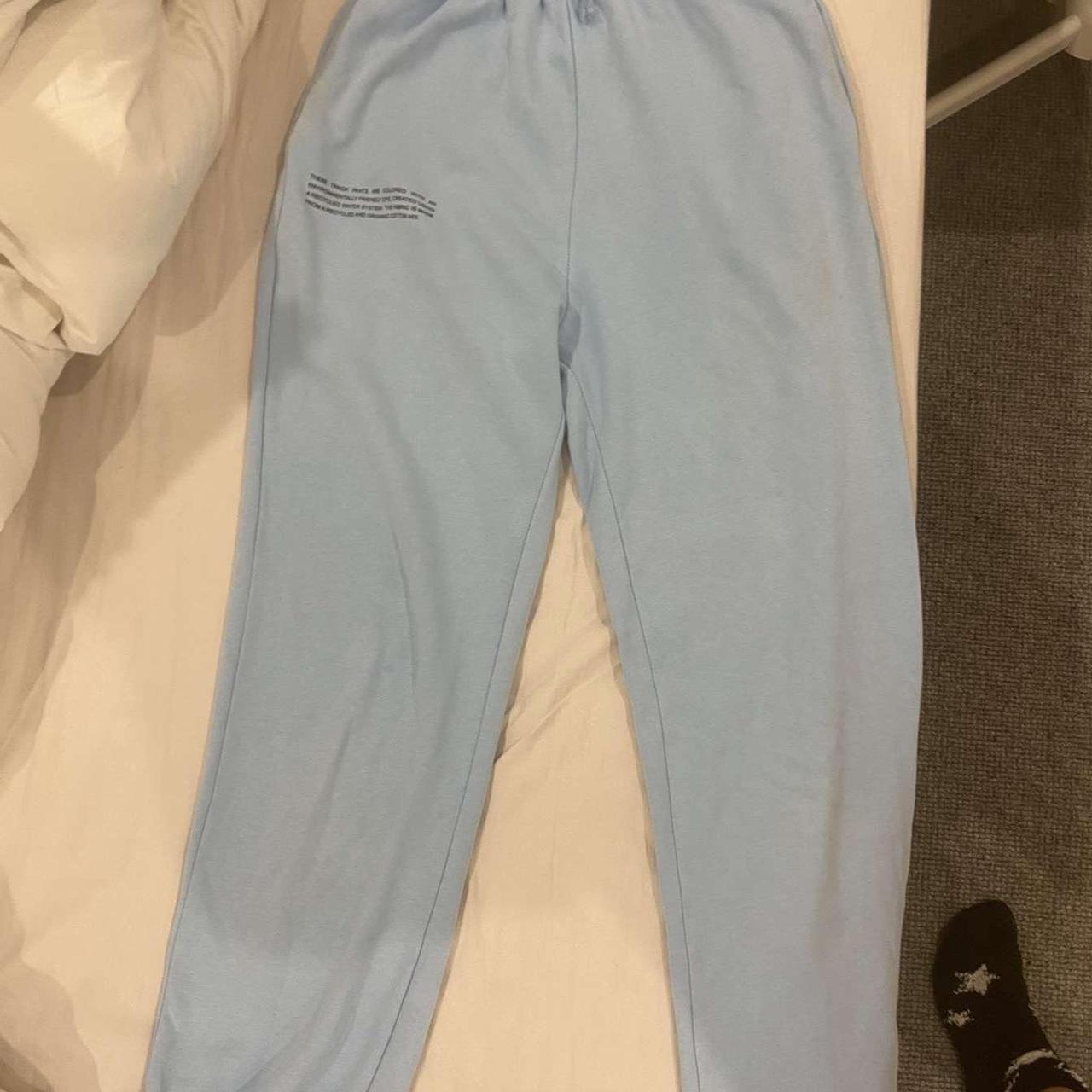 light blue pangaia trackies size small barely... - Depop