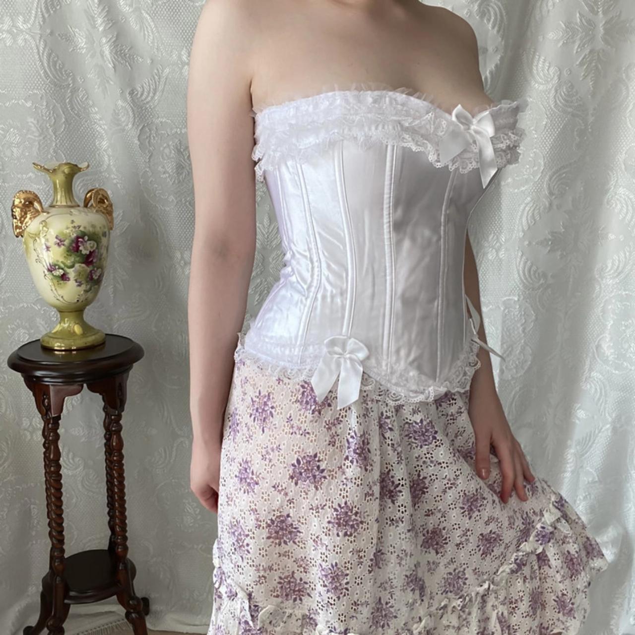 Glossy ivory corset bustier top. Absolutely... - Depop