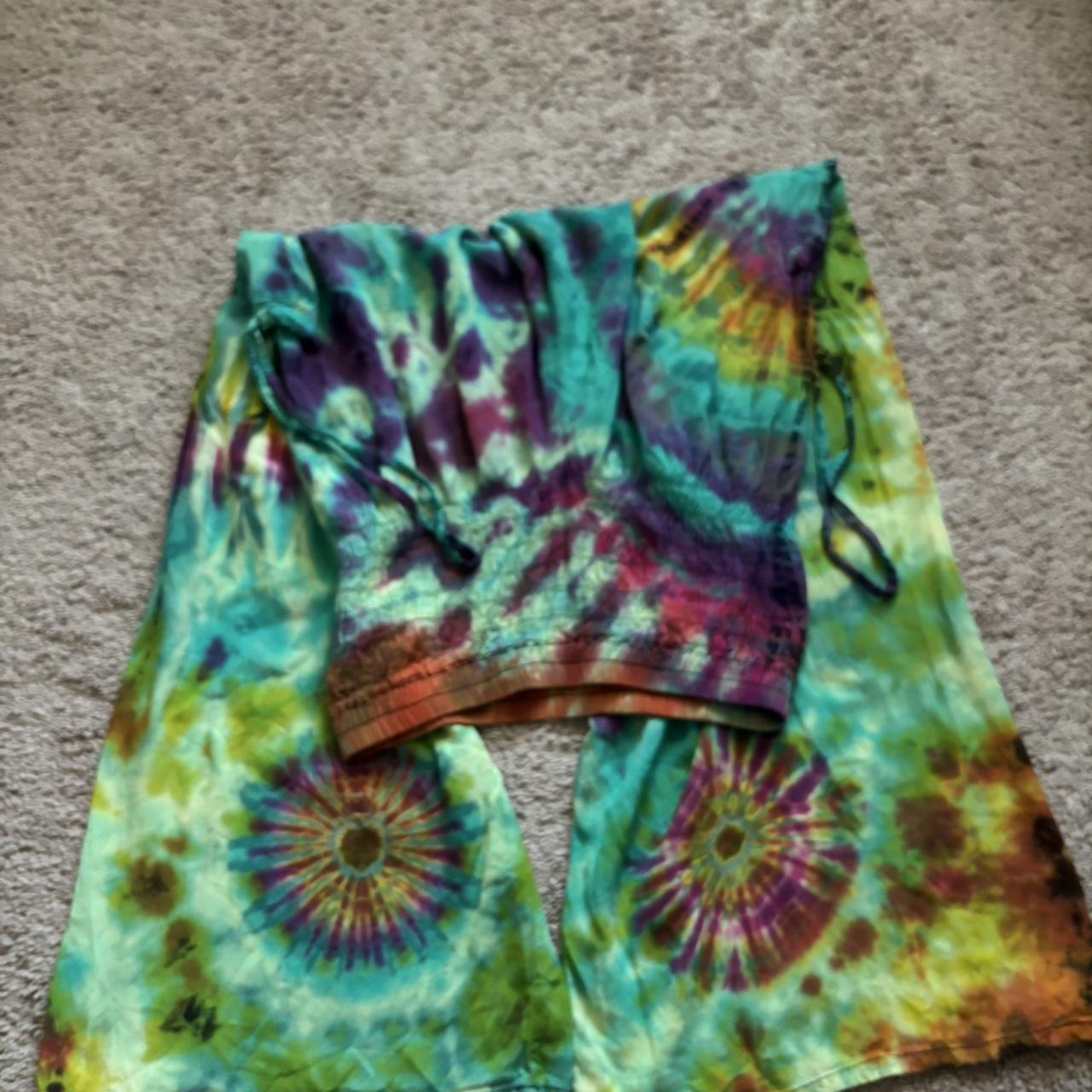 Multi-coloured tie-dye wide leg pants with two... - Depop