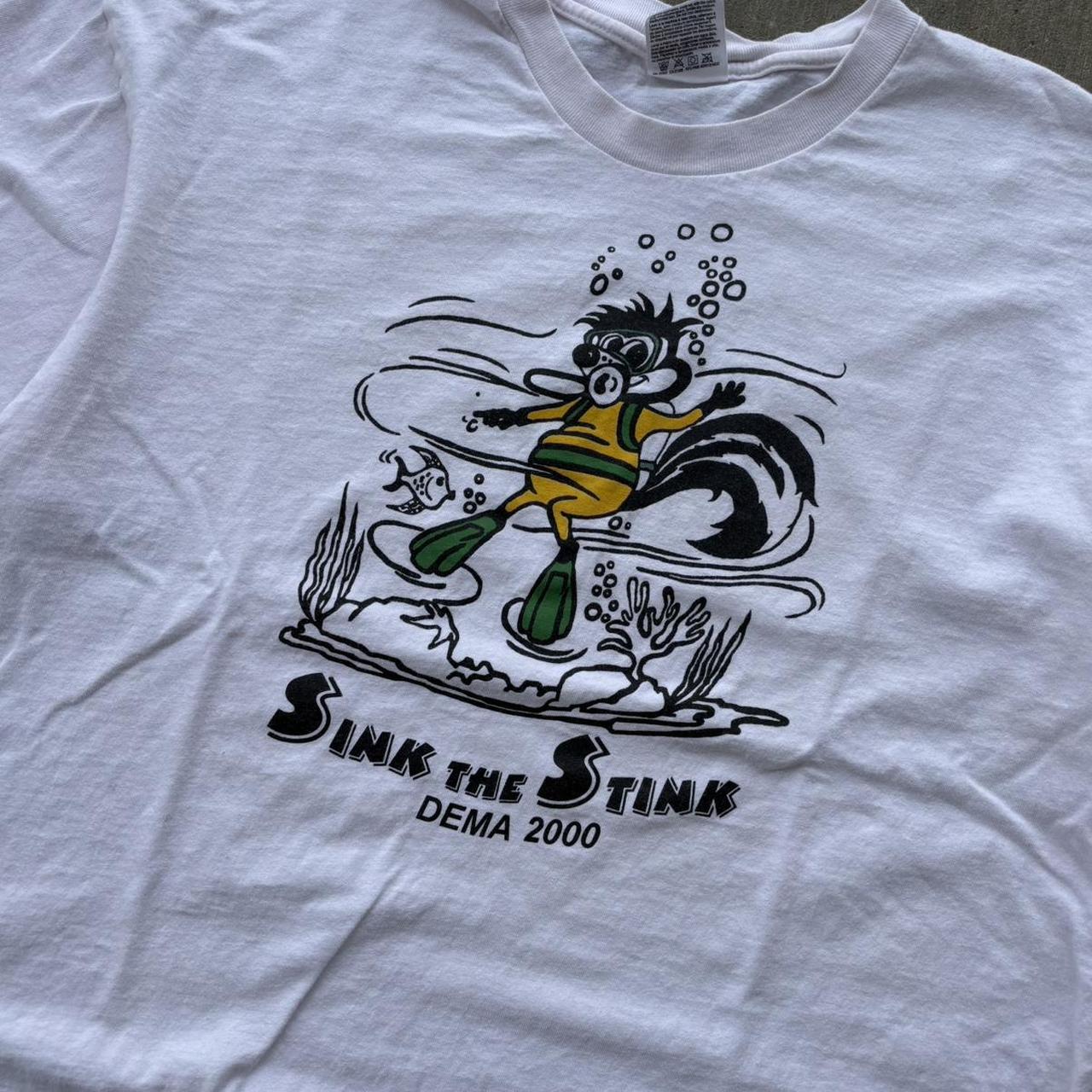 Vintage 2000 Sink the Stink funny skunk diving... | Depop